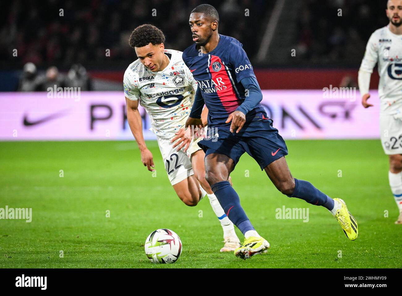 Paris, France. 10th Feb, 2024. Tiago SANTOS of Lille and Ousmane DEMBELE of PSG during the ...
