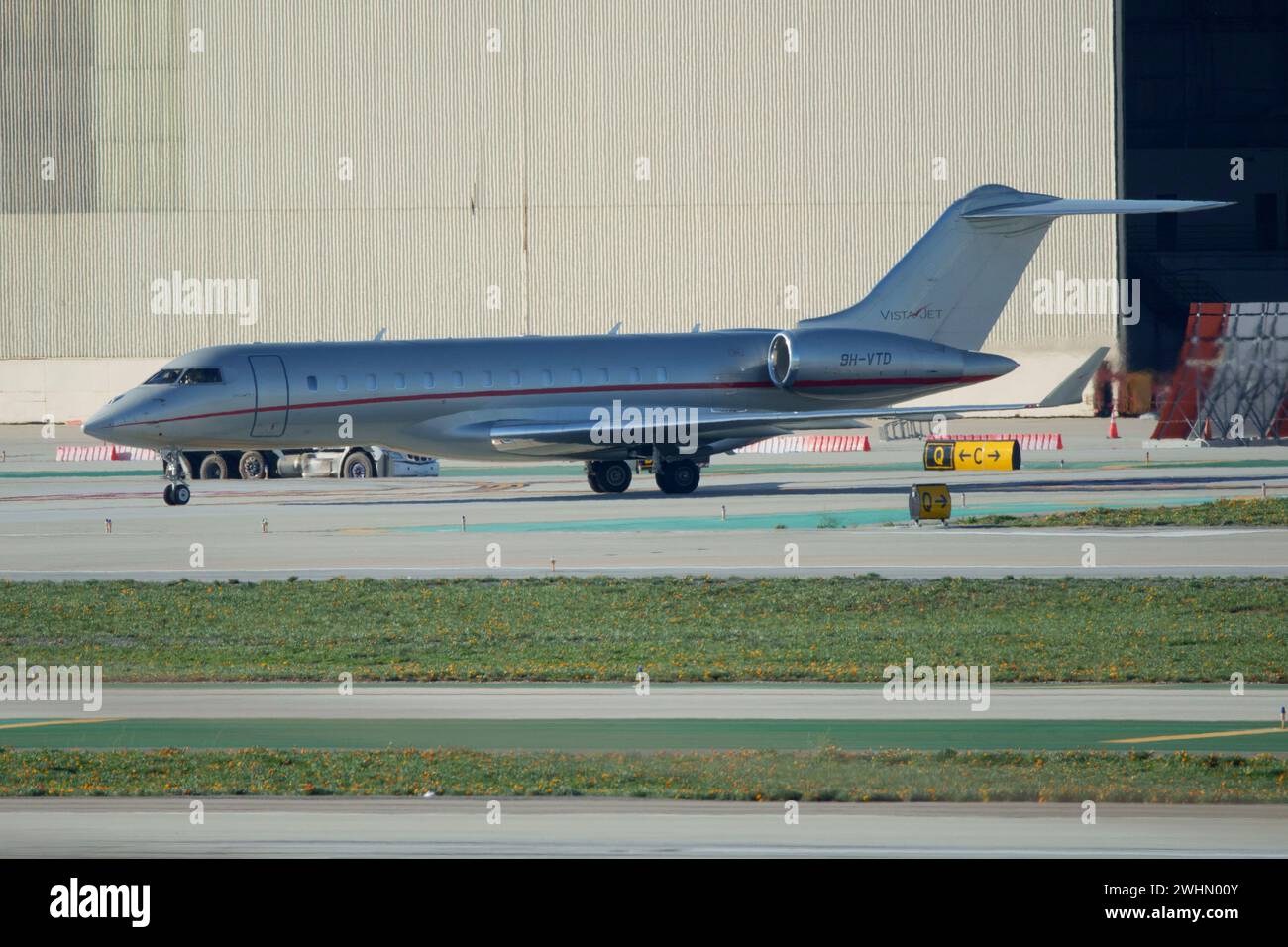 A VistaJet private jet, dubbed "The Football Era," with the tail number ...