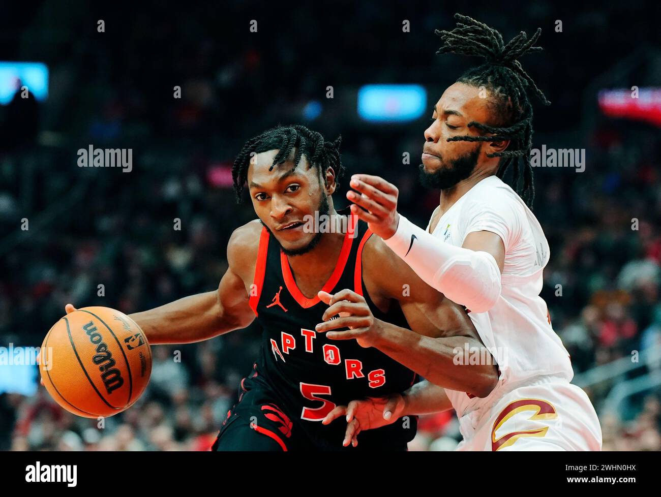 Toronto Raptors guard Immanuel Quickley (5) drives past Cleveland ...