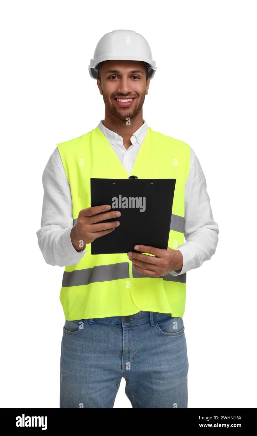 Engineer in hard hat holding clipboard on white background Stock Photo ...