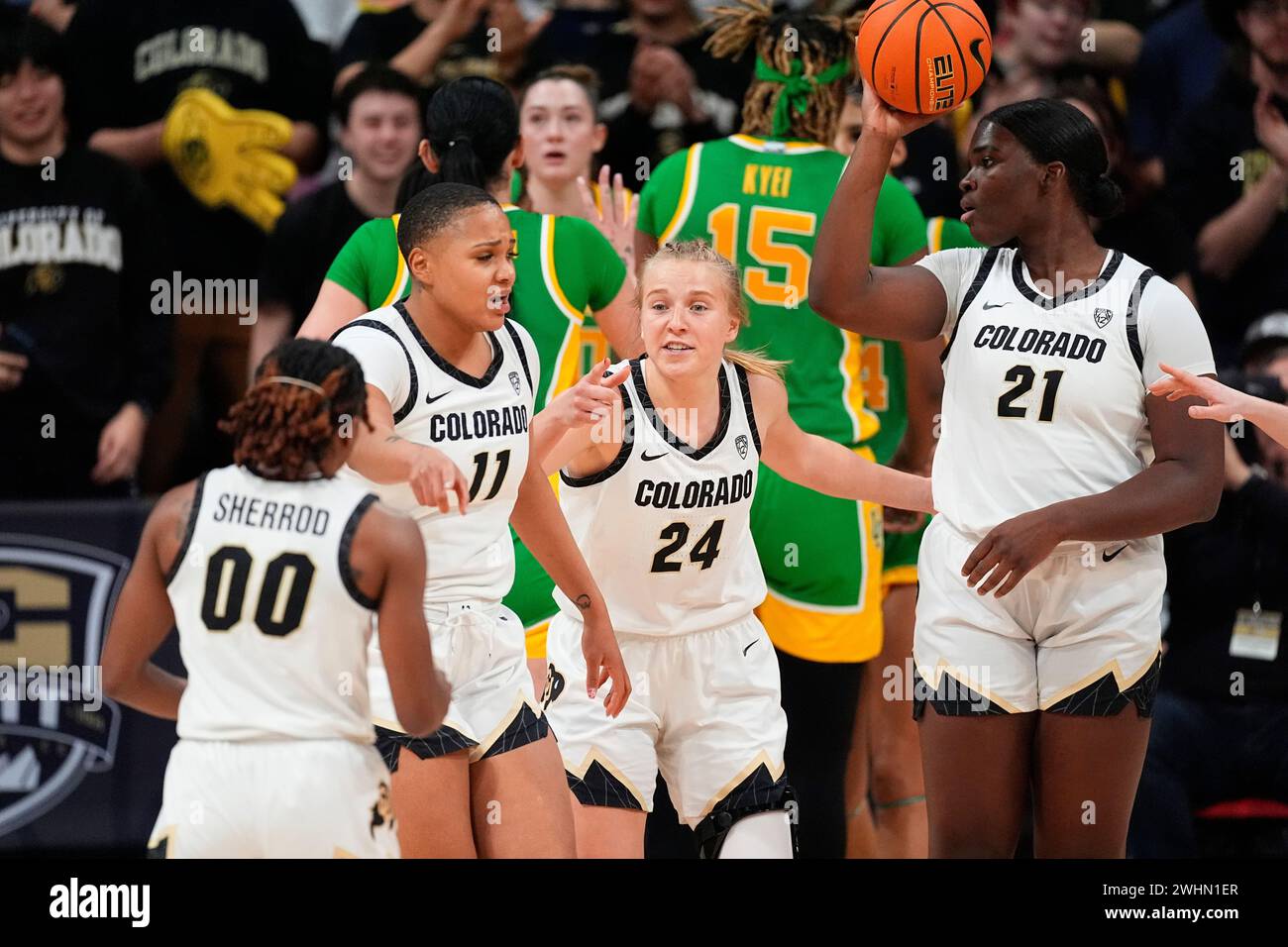 Fron front left, Colorado guard Jaylyn Sherrod , forward Quay Miller ...