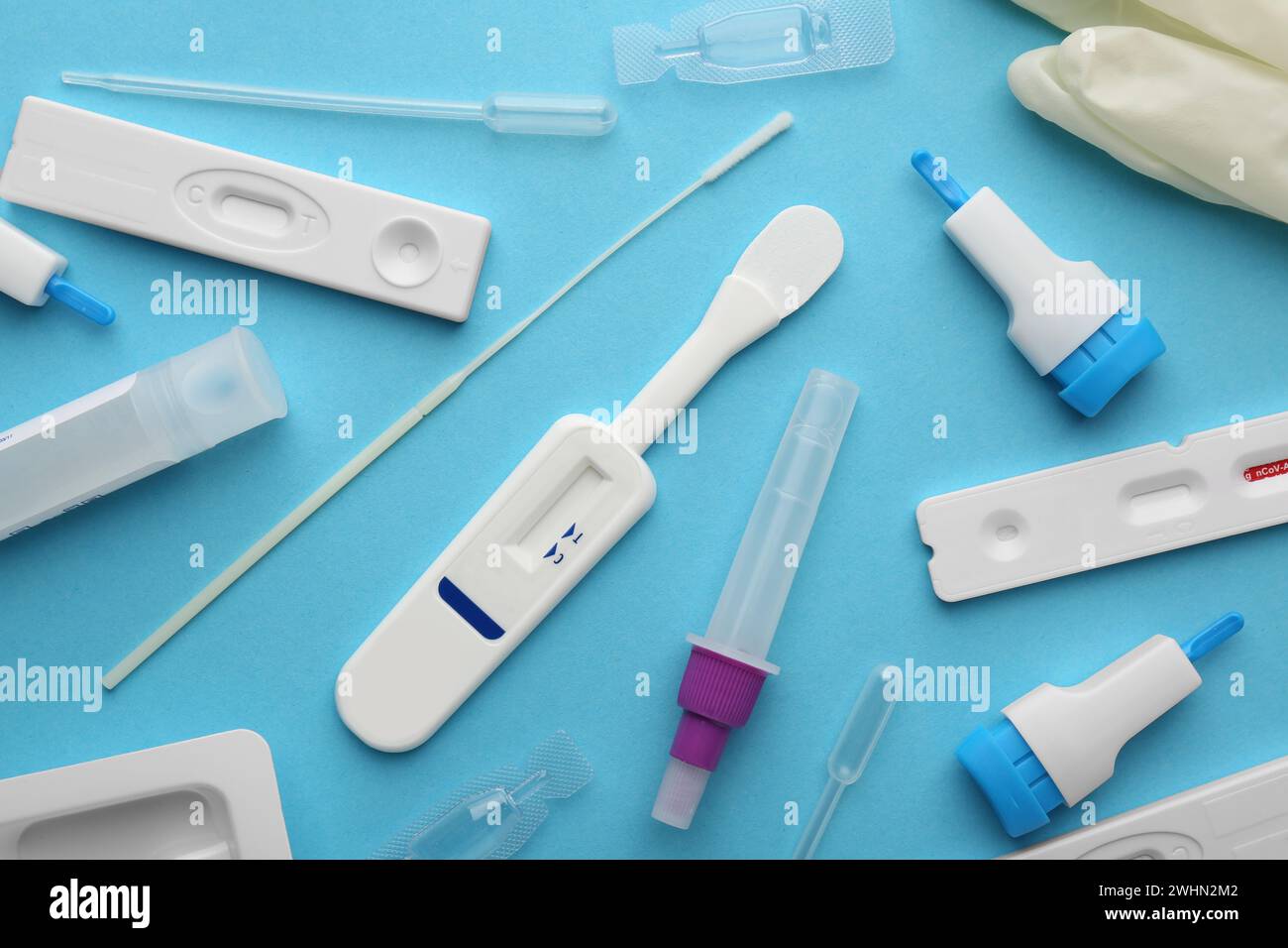 Disposable express test kits on light blue background, flat lay Stock ...