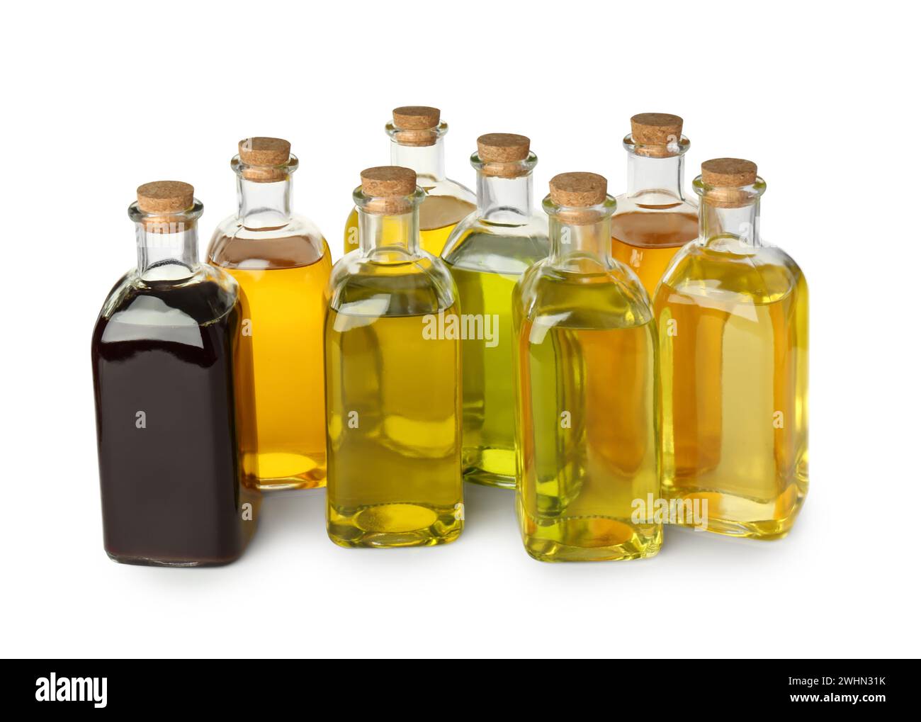 Vegetable fats. Bottles of different cooking oils isolated on white ...