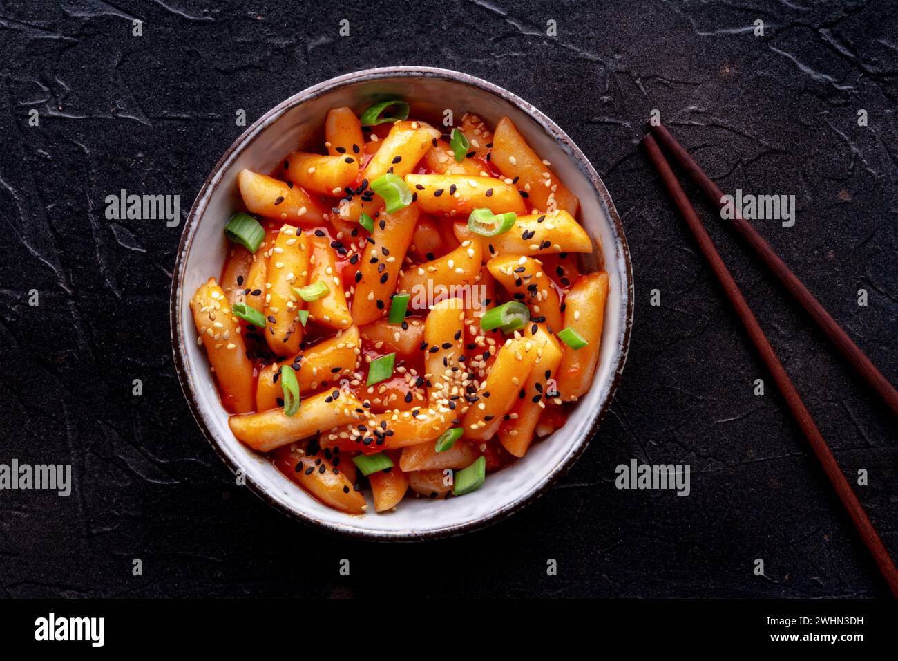 Tteokbokki or topokki, Korean street food, spicy rice cakes Stock Photo ...