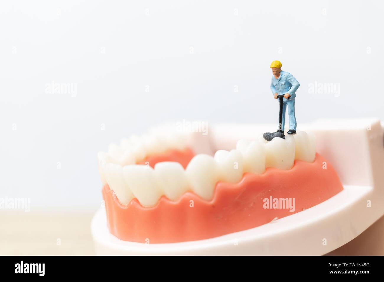 Miniature people worker team repairing hi-res stock photography and ...