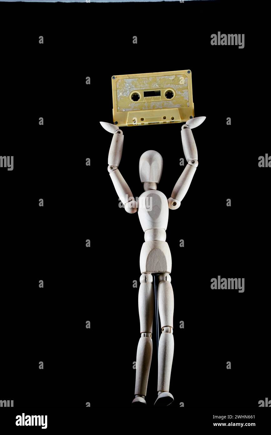 Wooden dummy figurine and cassette audio audiocassette tape, music ...