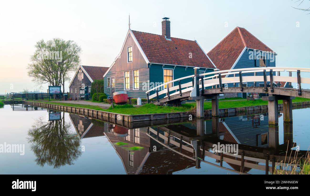 Sunset at the windmill village Zaanse Schans during Spring in the ...