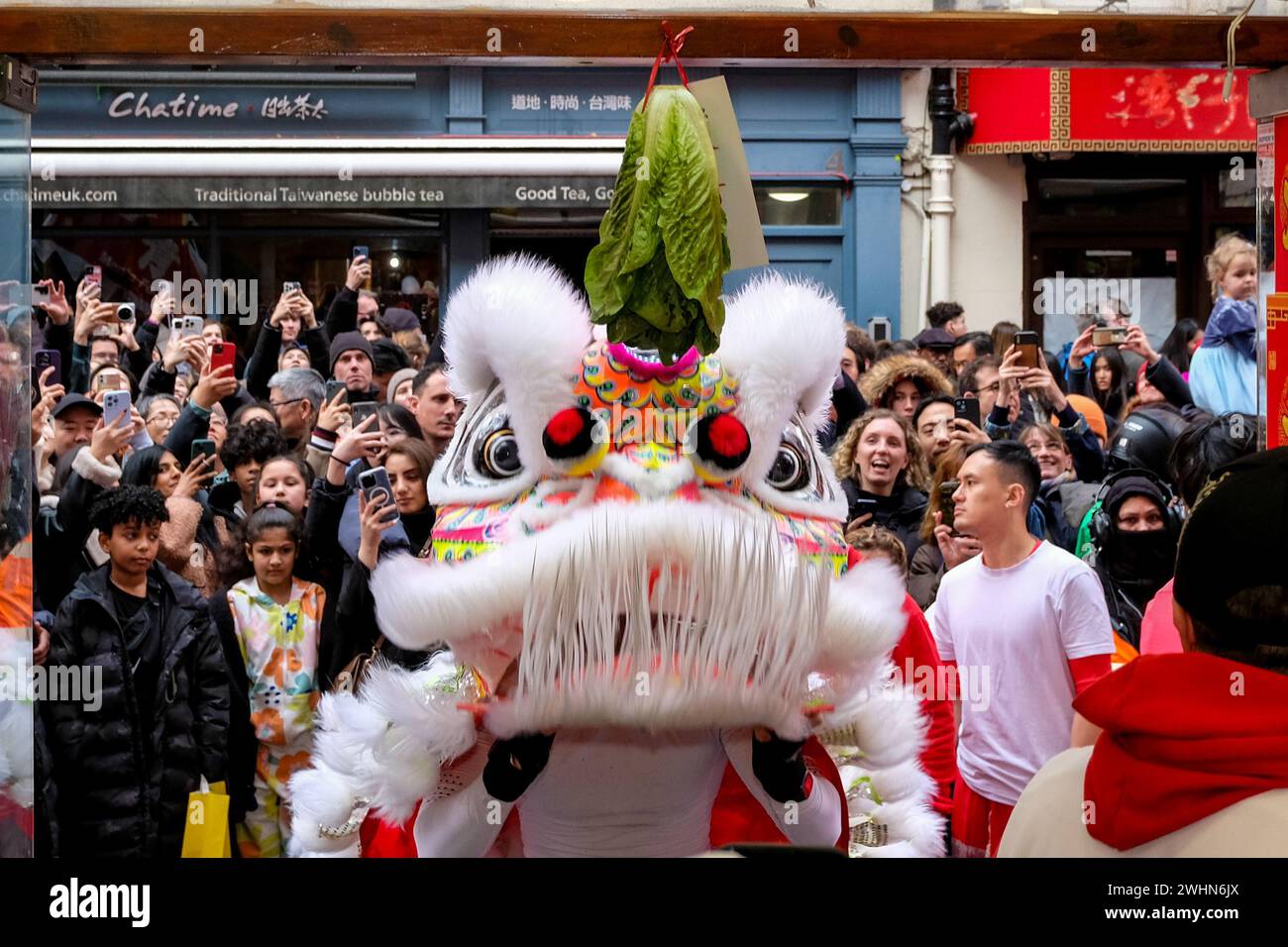 London, UK, 10th February, 2024. Lion dance troupes dance in Chinatown ...