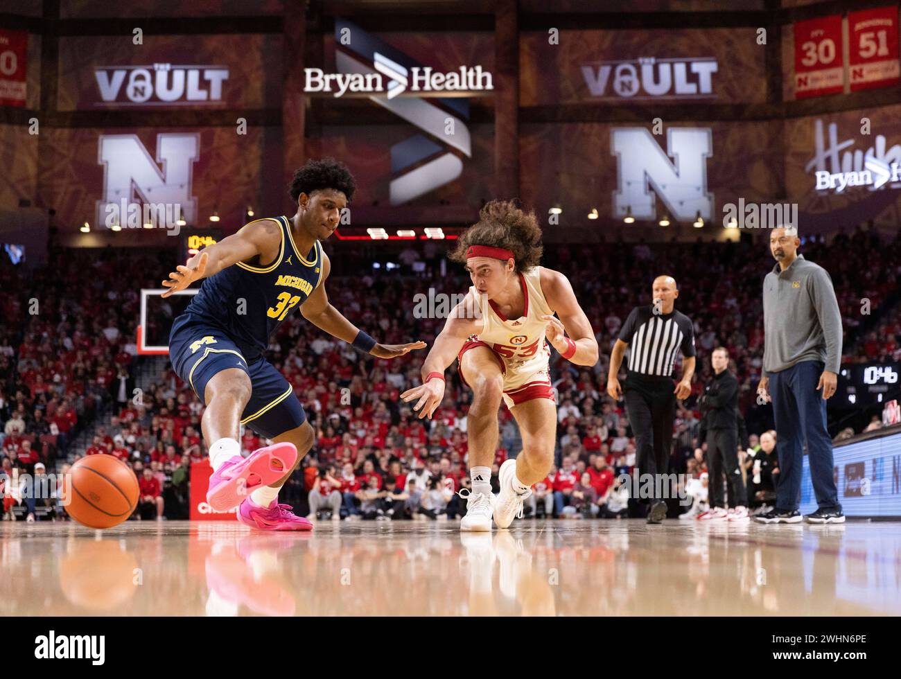 Nebraska's Josiah Allick (53) passes the ball around Michigan's Tarris ...