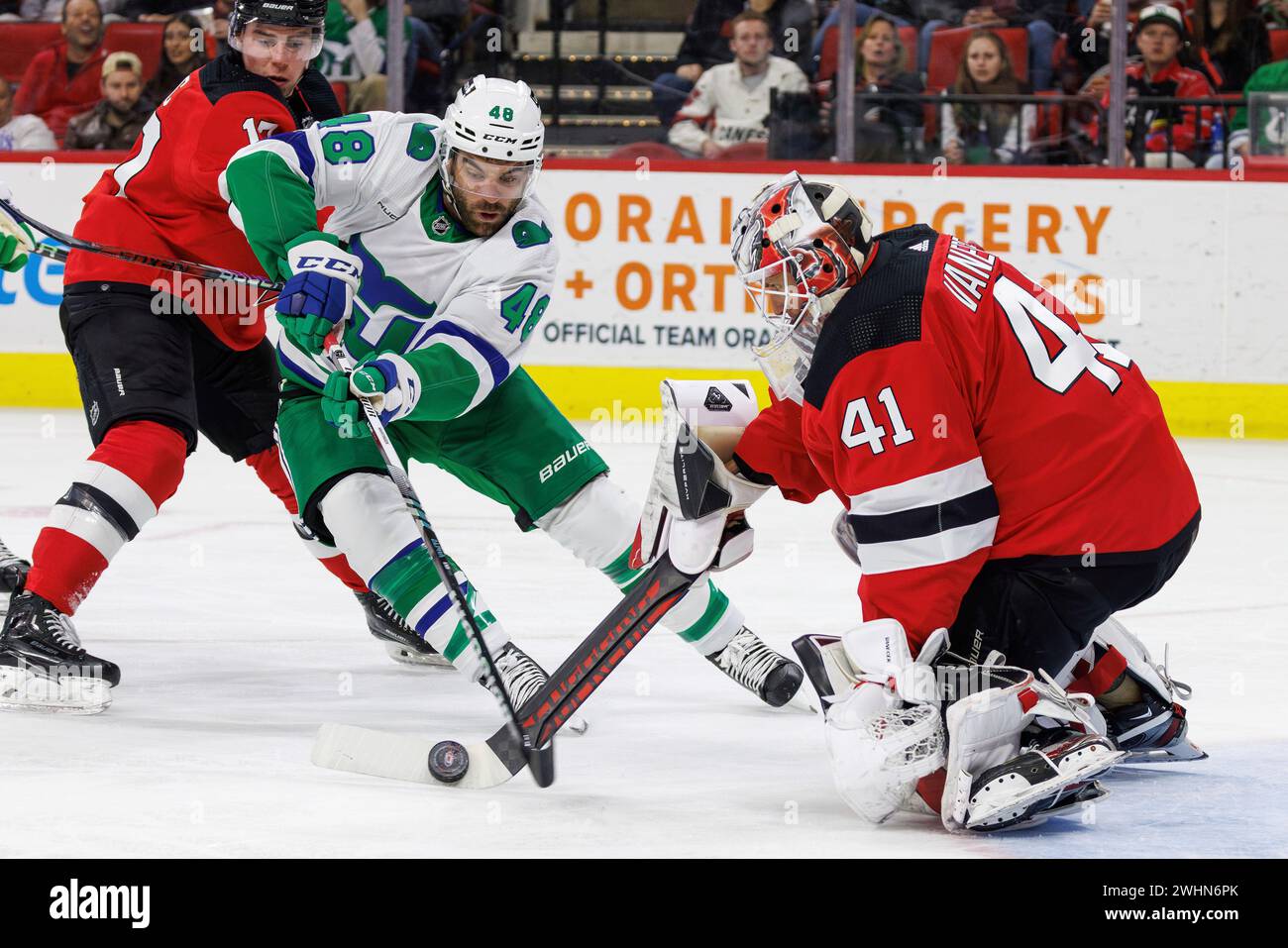 Carolina Hurricanes' Jordan Martinook (48) handles the puck in front of ...