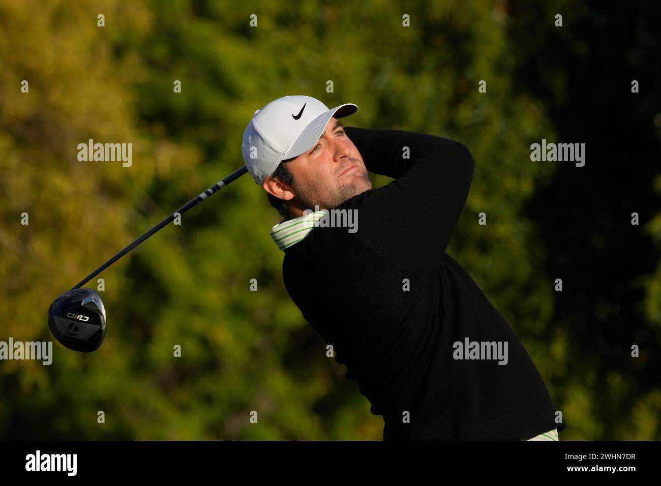 Scottie Scheffler hits his tee shot at the fifth hole during the third ...