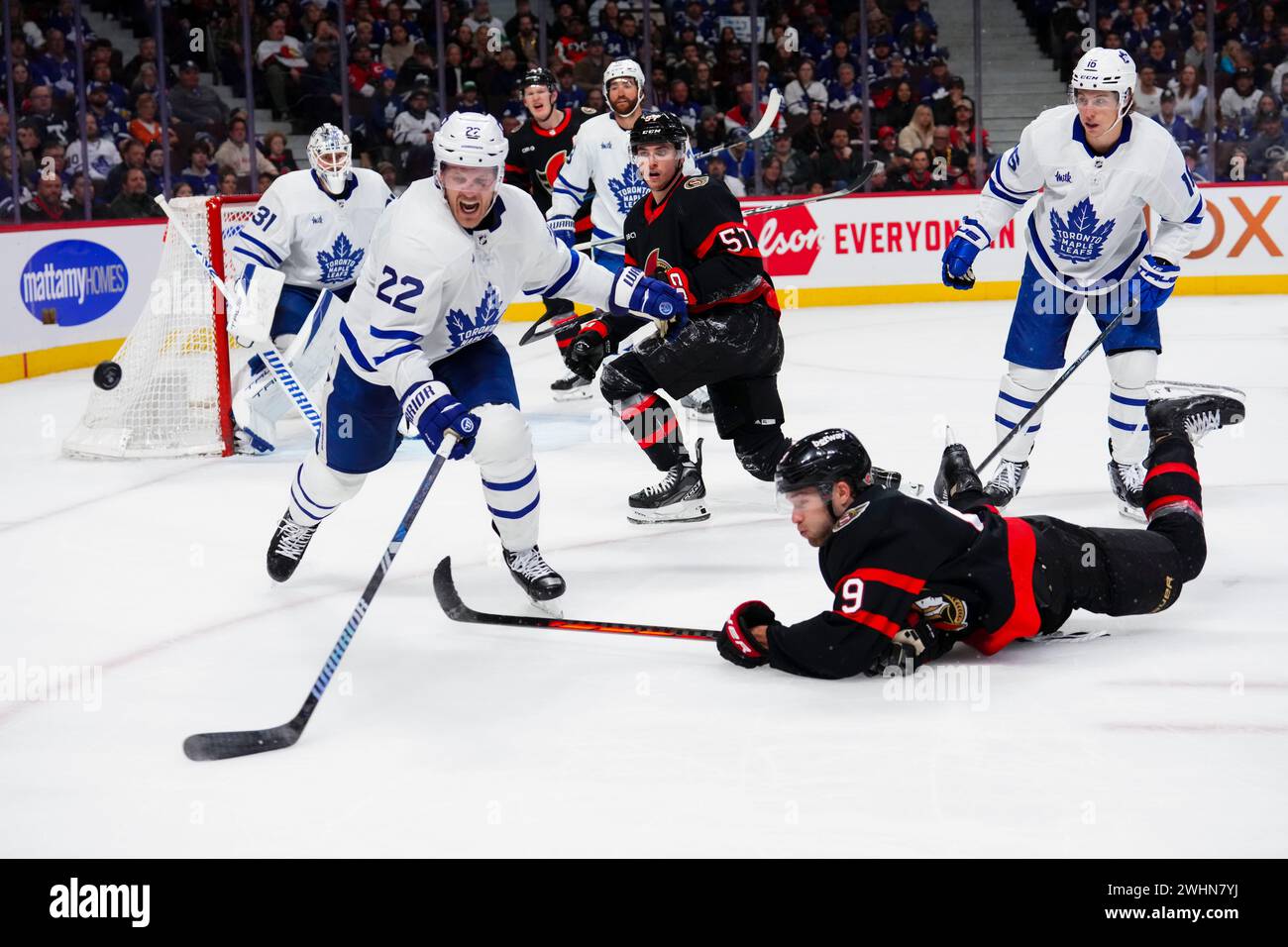 Ottawa Senators center Josh Norris (9) trips as Toronto Maple Leafs ...