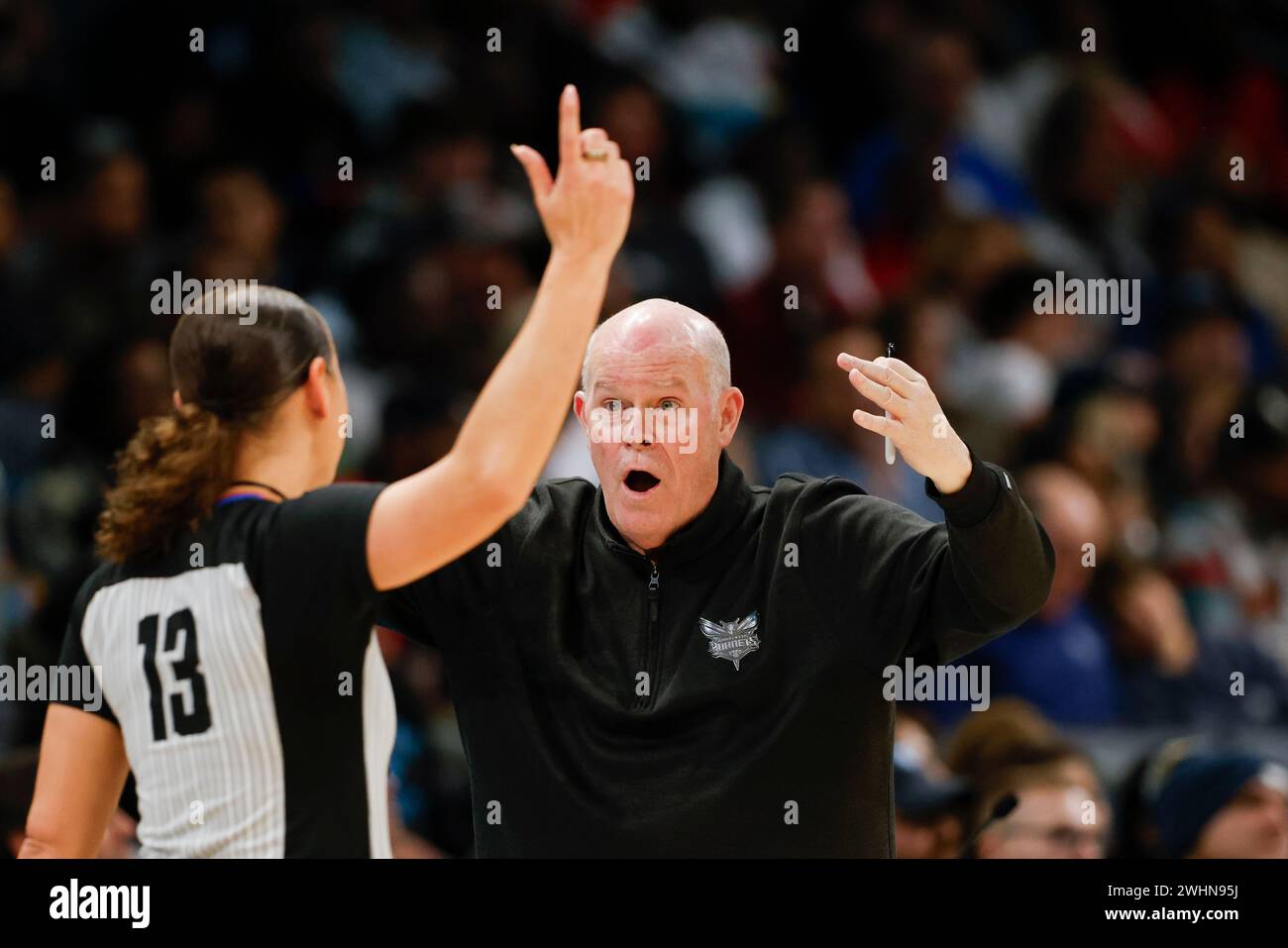 Charlotte Hornets head coach Steve Clifford, right, argues a call with ...