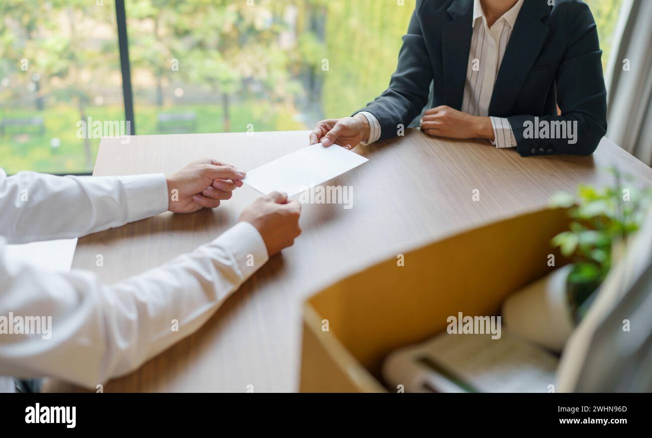 Quit Job Business man sending resignation letter and packing Stuff ...