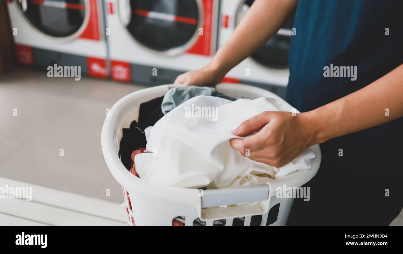 Man washing clothes by hand hi-res stock photography and images - Alamy