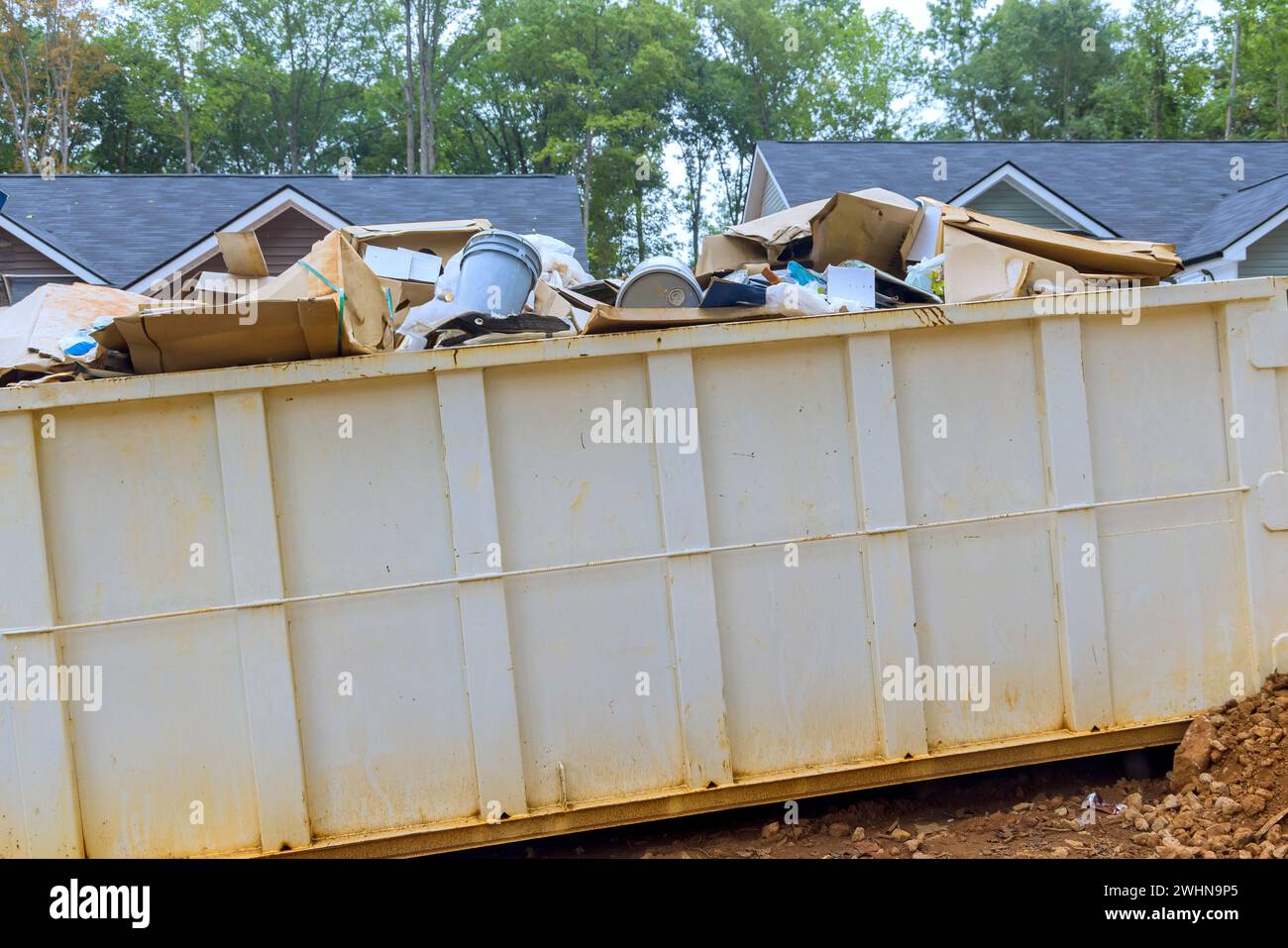 Metal container dumpster is available at construction site for disposal ...