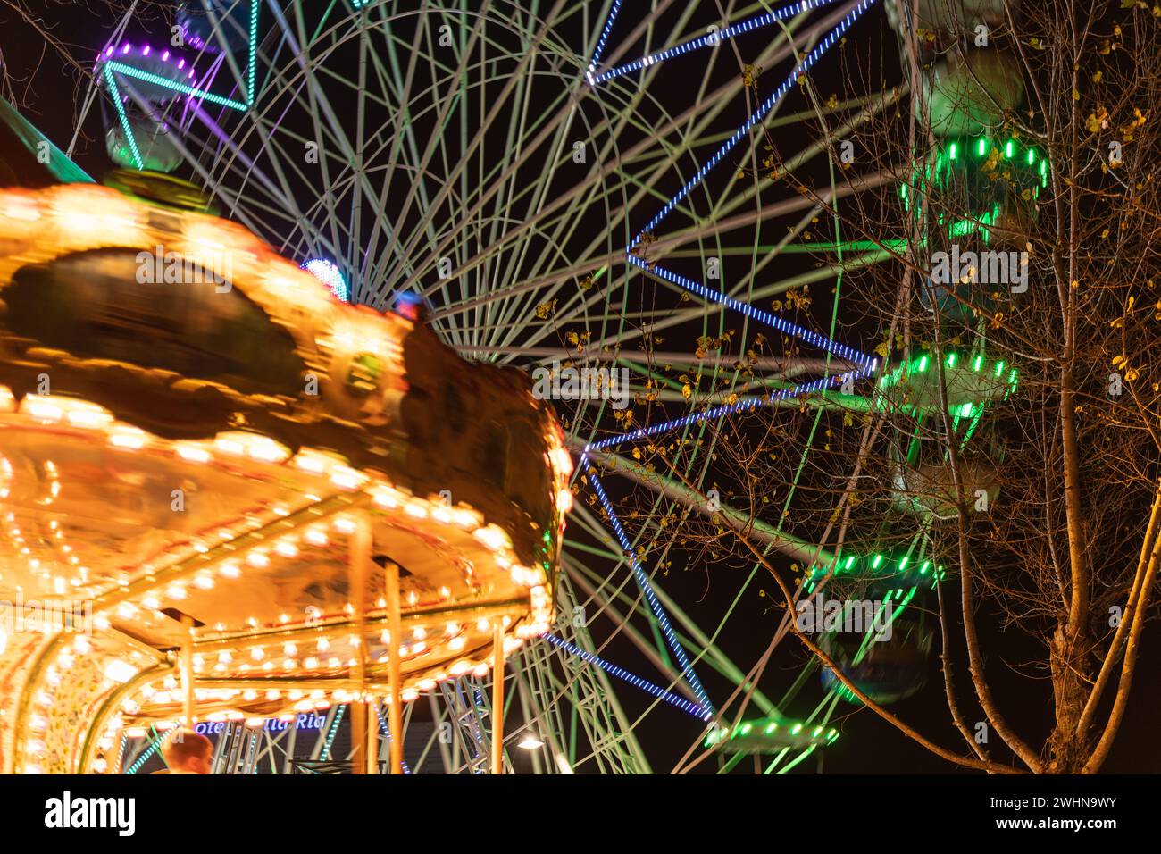 Spinning ferris wheel in motion Stock Photo - Alamy