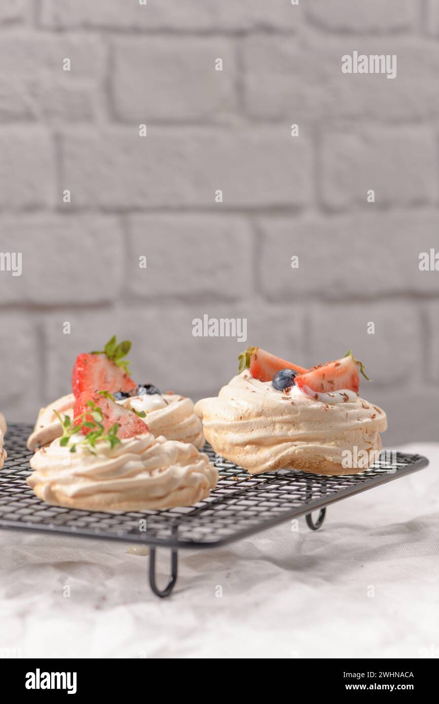 Small pavlova cakes Stock Photo - Alamy