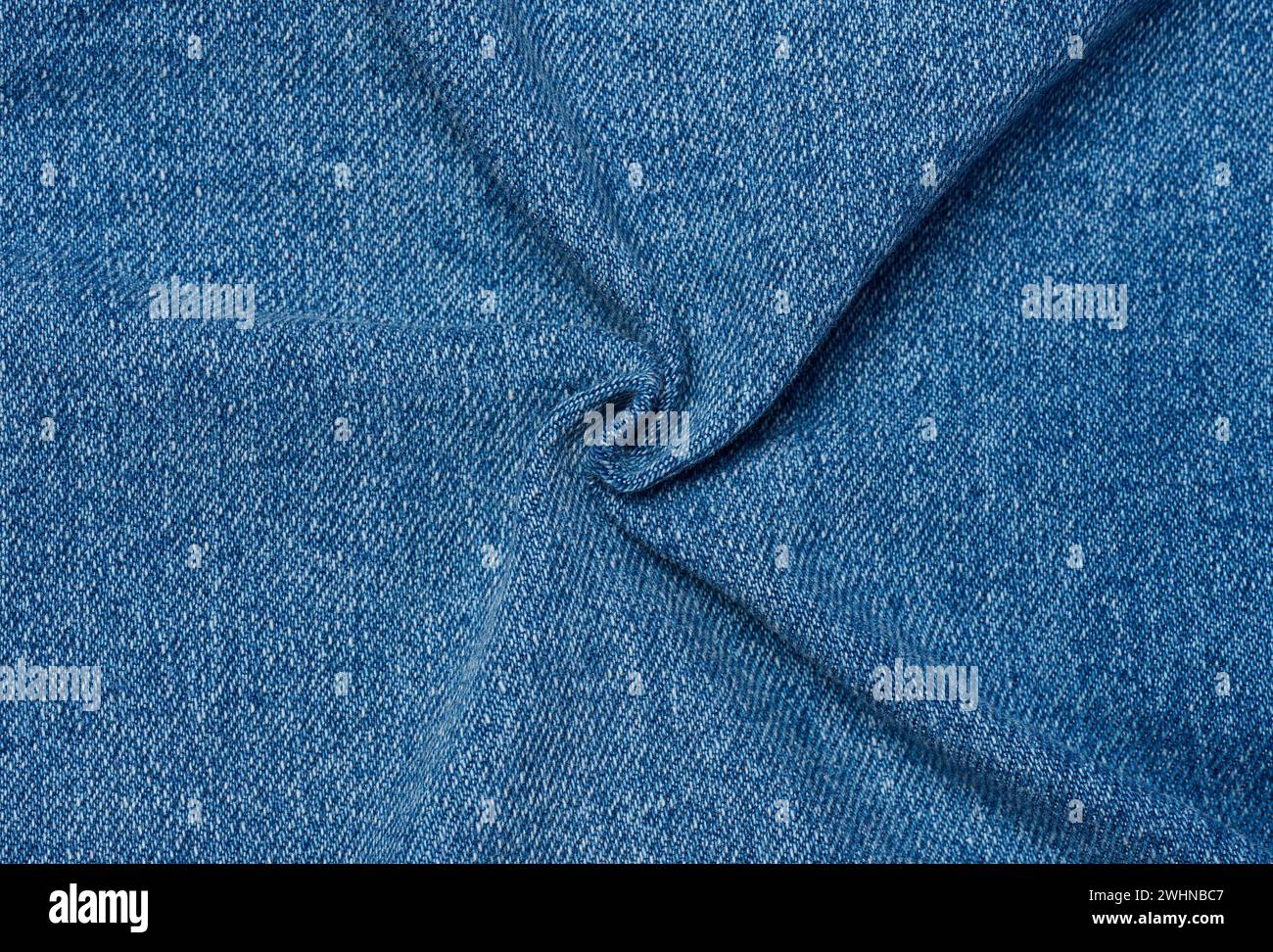 Blue denim, twisted material Stock Photo - Alamy