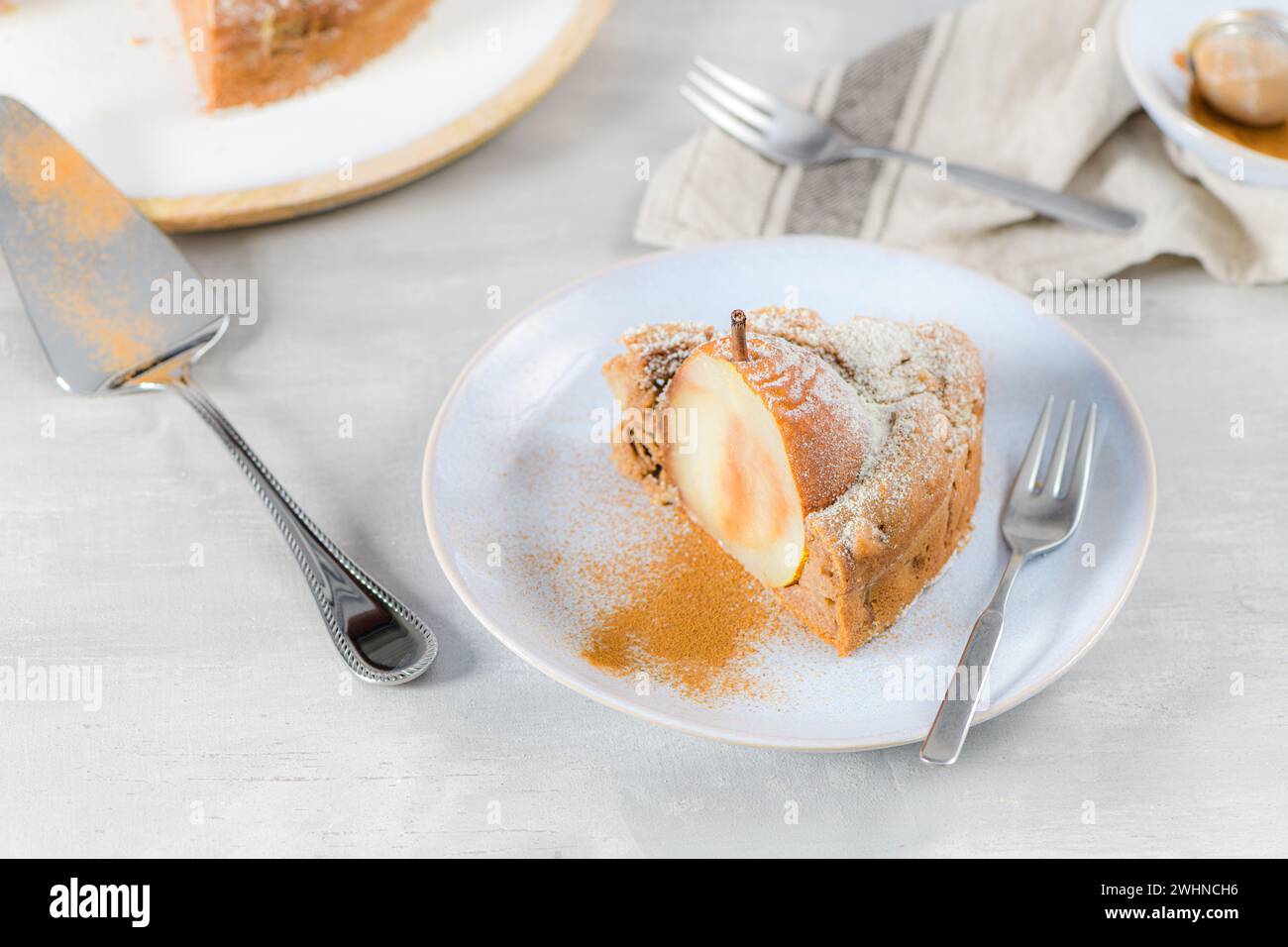 Delicious cake slice with pear and cinnamon Stock Photo - Alamy