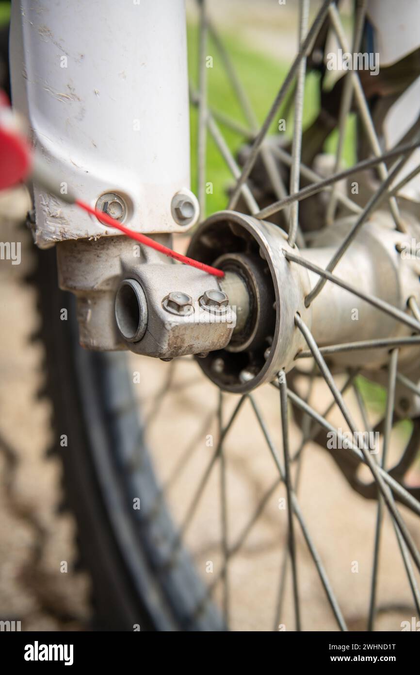 Lubricating motorcycle wheel bearings Stock Photo - Alamy
