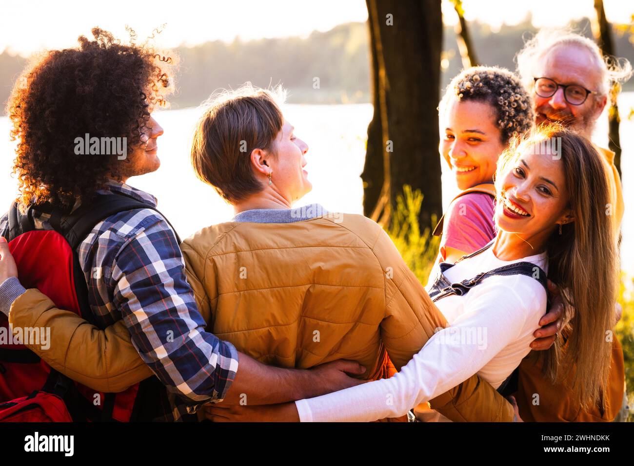 Unity in Diversity: Young Adventurers Embrace Sunset's Beauty Stock ...