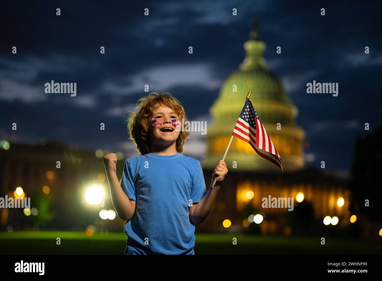 Election day for US Citizens. Kid with US flag near capitol building in ...