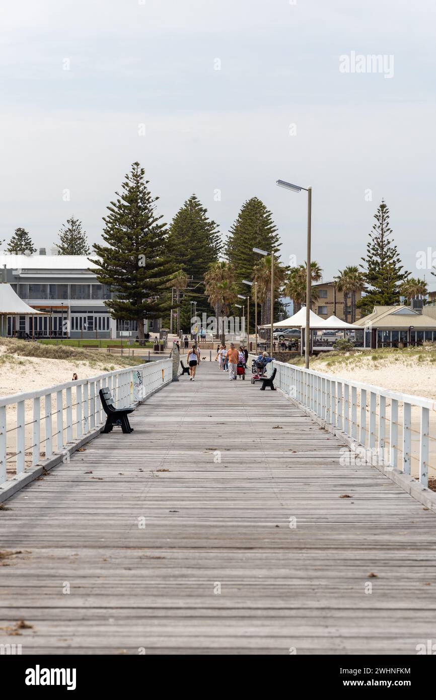 The iconic Grange Jetty looking back to the beach and buildings located ...