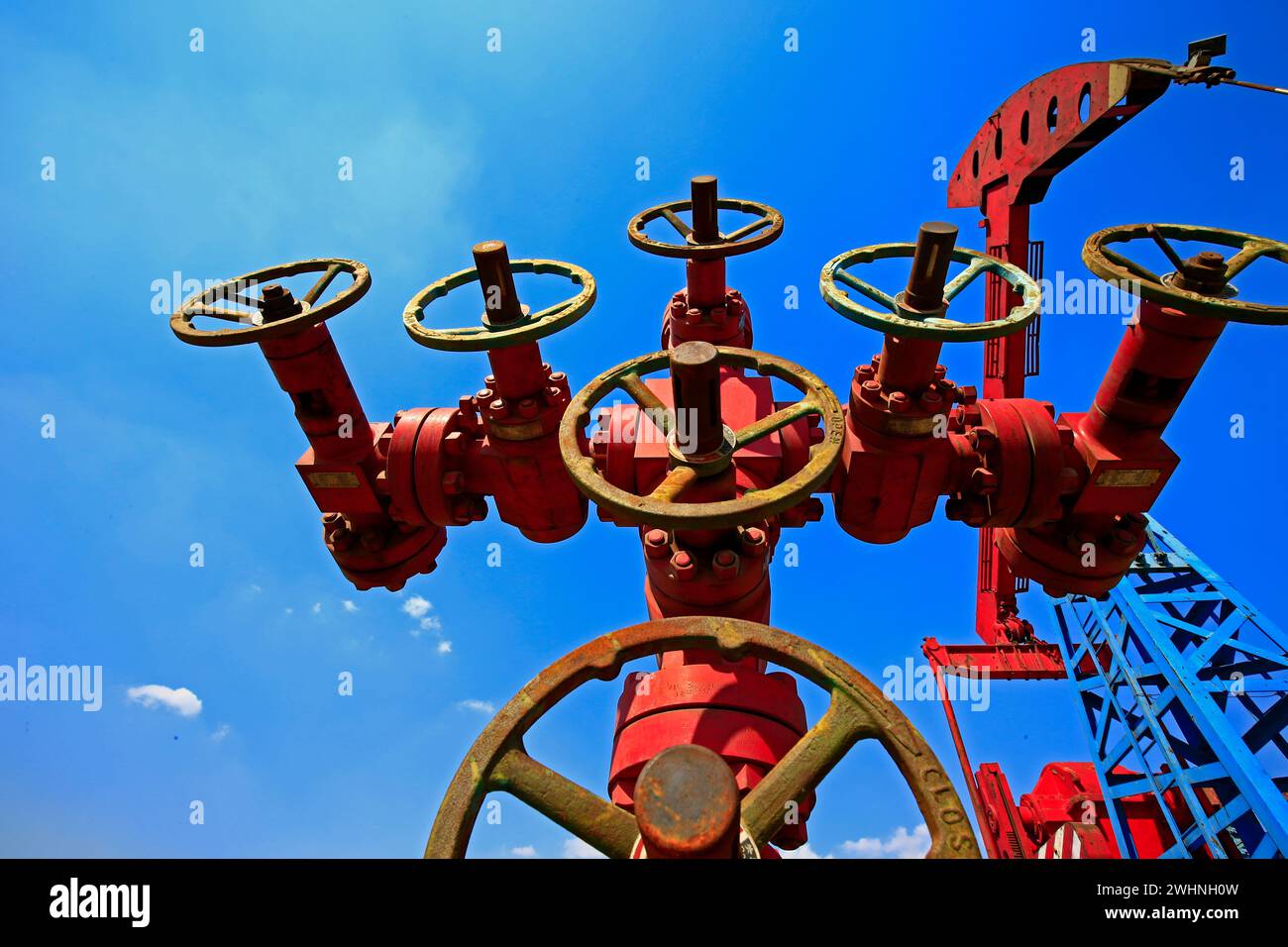 Oil pipes and valves Stock Photo - Alamy