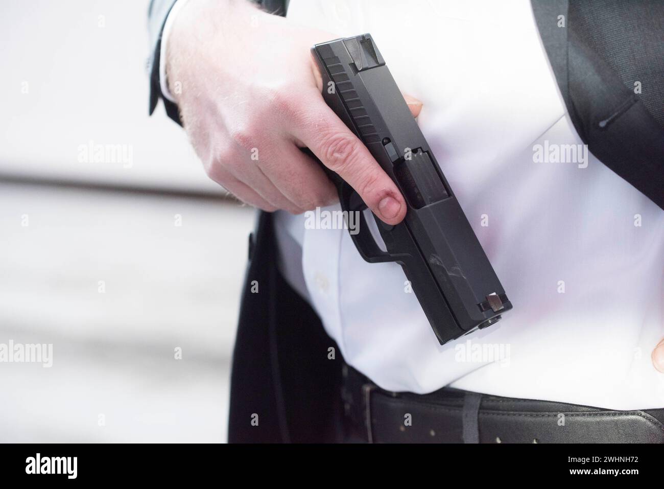 An attacker with a gun Stock Photo - Alamy