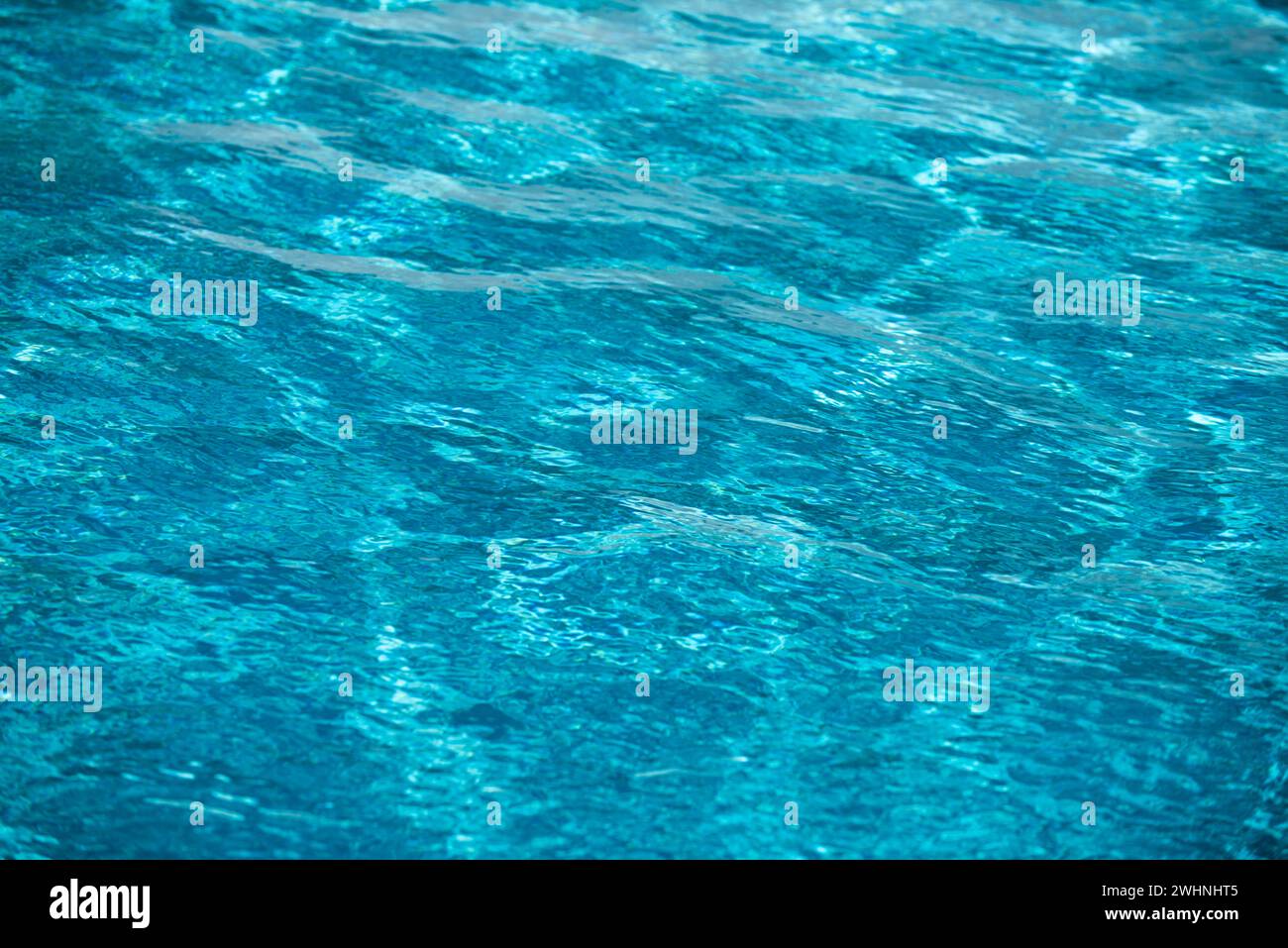 Water in swimming pool, background with high resolution. Wave abstract or rippled water texture ...