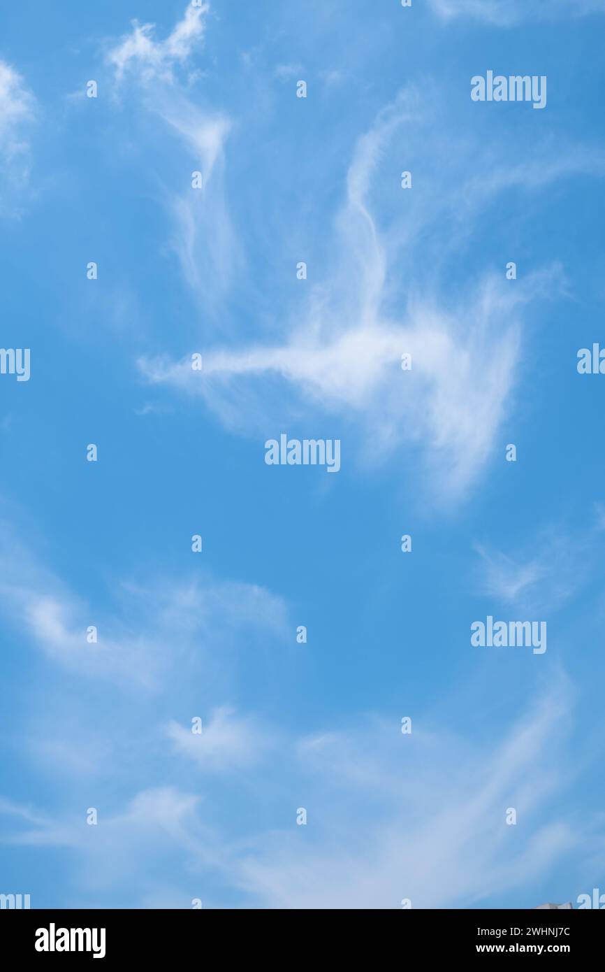 Blue sky with clouds background Stock Photo - Alamy