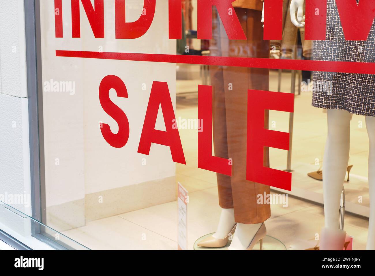 Sale signs in a clothing store Stock Photo - Alamy