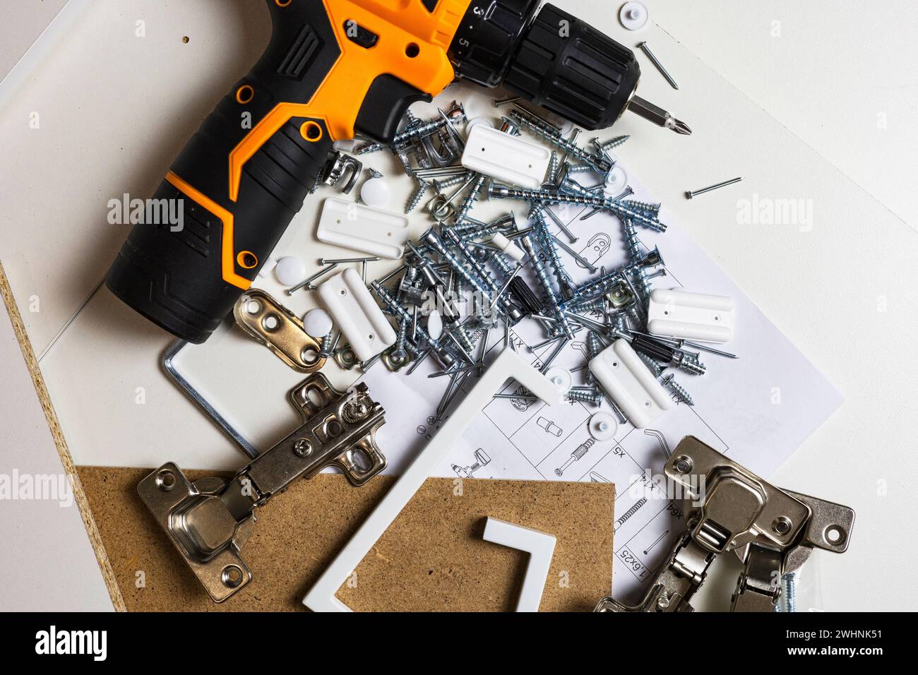 Furniture fittings. Furniture assembly hardware options and tools on a ...