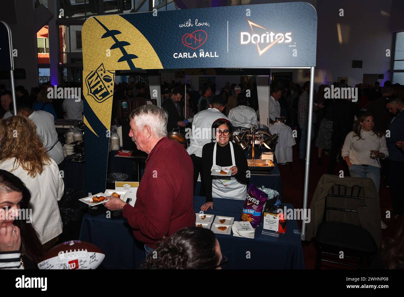 Las Vegas, NV, USA. 10th Feb, 2024. Chef Carla Hall's booth offered ham ...