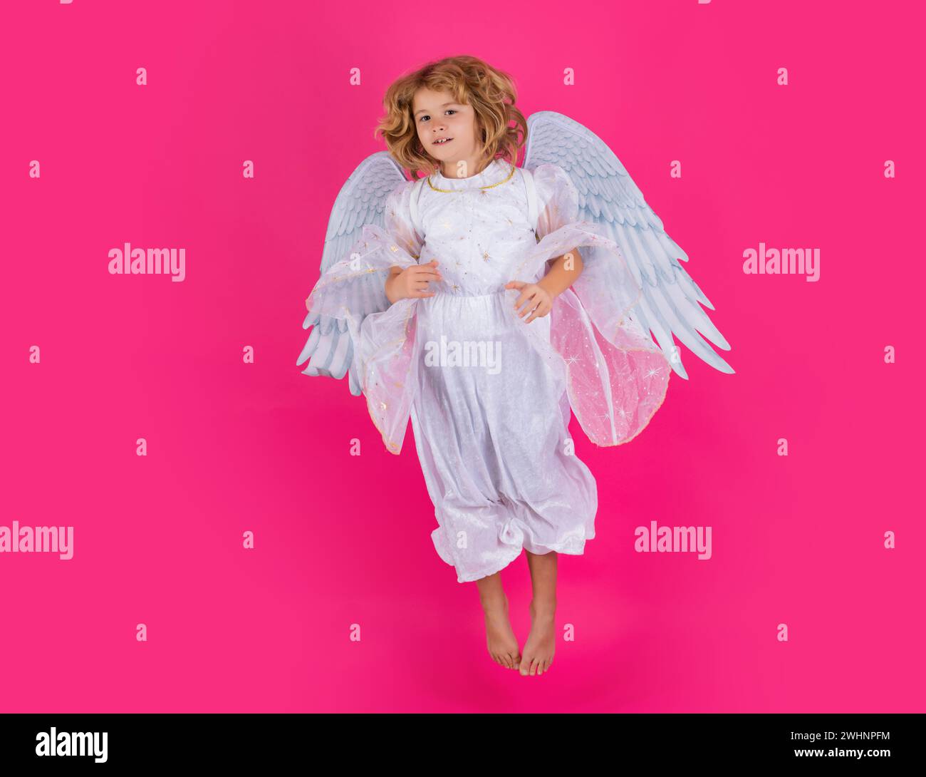Little angel jump, kids jumping, full body. Little angel fly. Portrait ...
