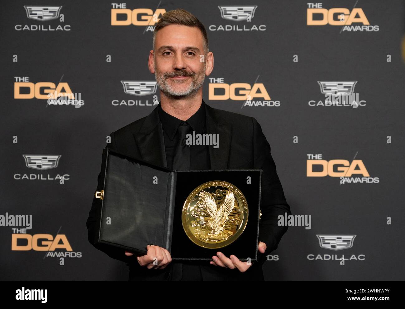 Director Peter Hoar poses with his DGA Award for Dramatic Series for ...