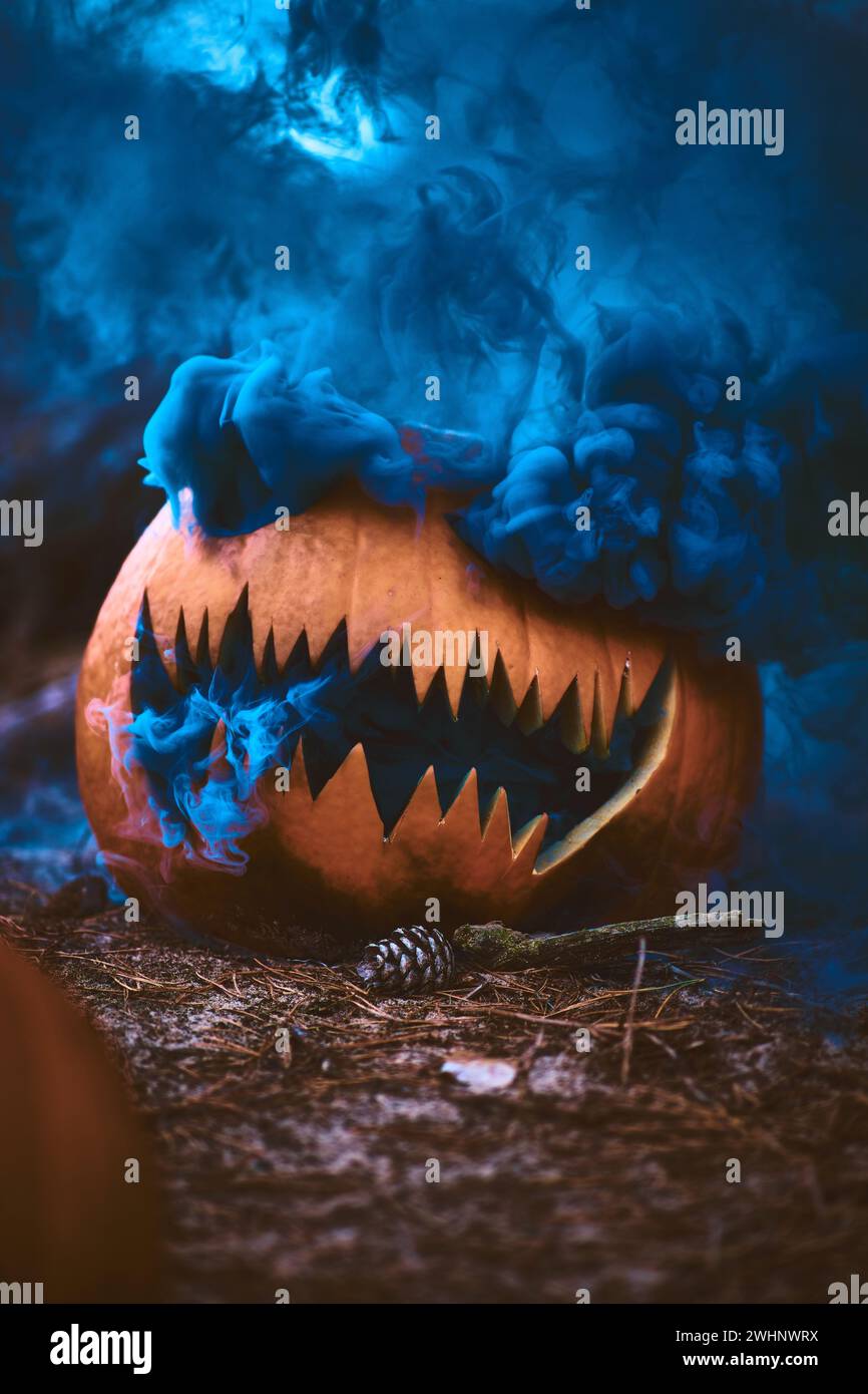 Halloween pumpkin with smoke and flame hi-res stock photography and ...