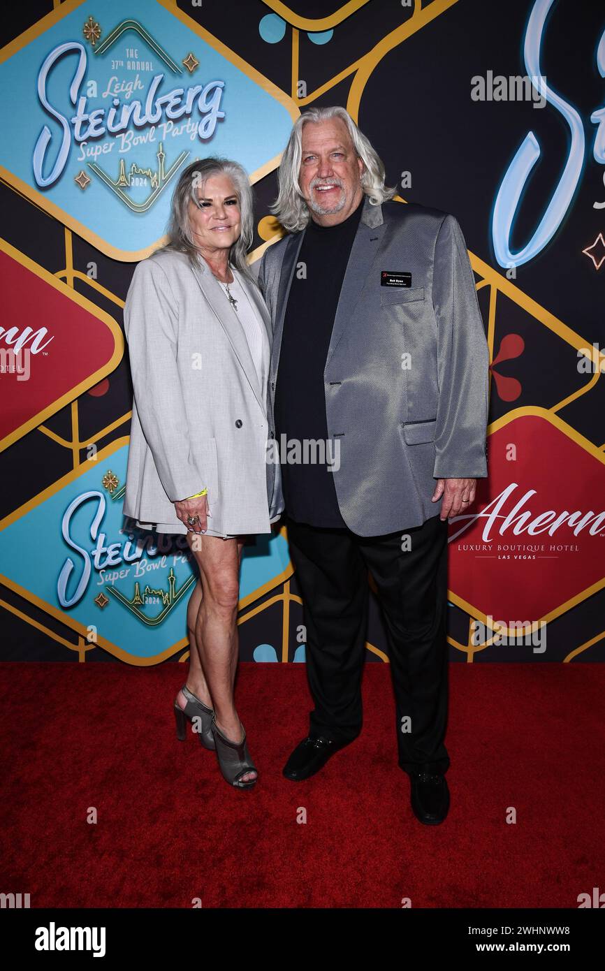 Las Vegas, USA. 10th Feb, 2024. Kristin Ryan and Rob Ryan walking on the red carpet at Leigh ...