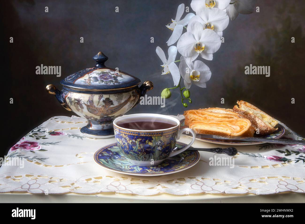 Still life with cup of tea and cake Stock Photo - Alamy