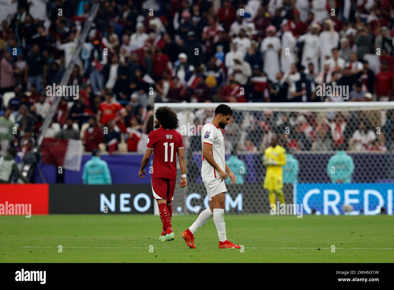 Lusail, Qatar. 10th Feb, 2024. Mousa Altamari (JOR), Akram Afif (QAT ...