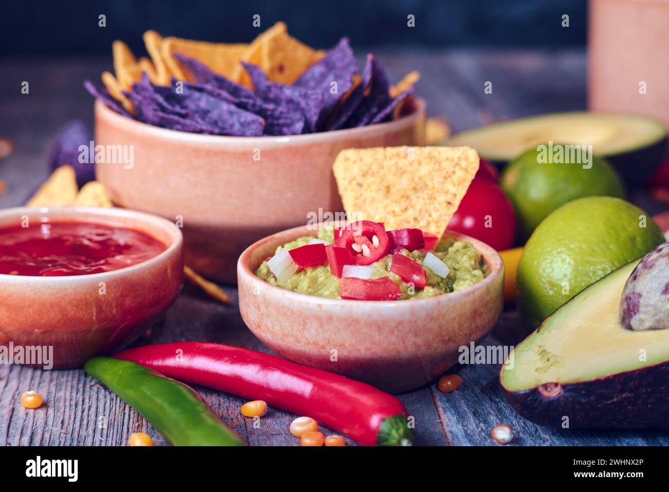 Bowls of Guacamole and Salsa with Tortilla Chips Stock Photo - Alamy