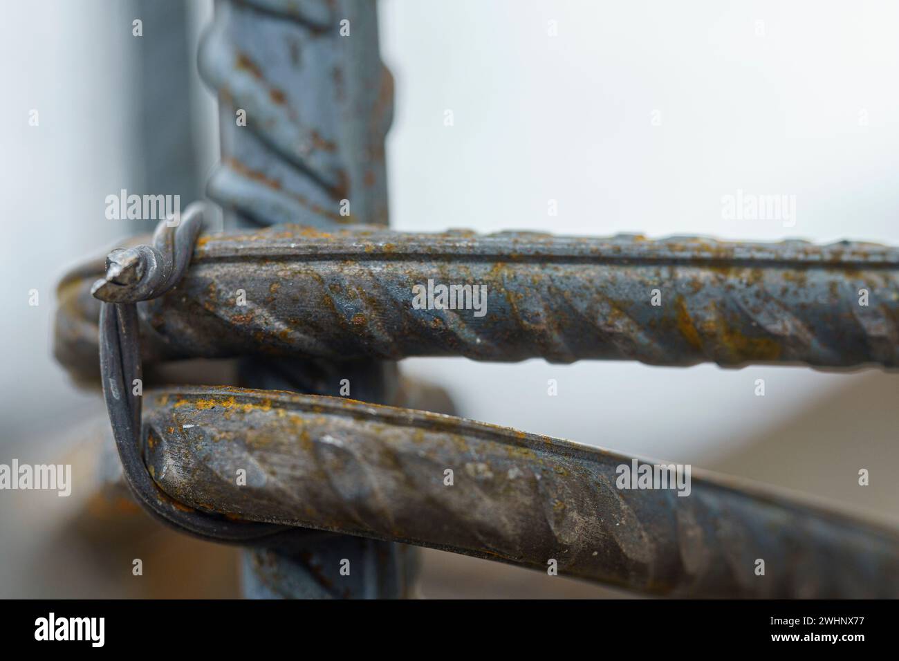 Rustic metal handle supporting chair armrest adorned with wires Stock ...