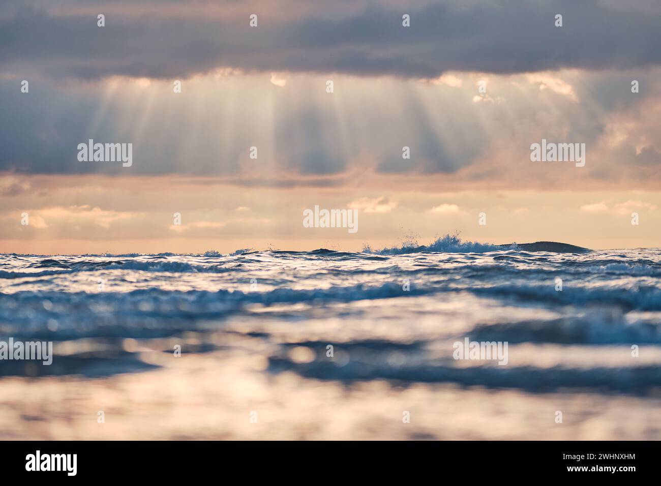 Sunbeams over the ocean hi-res stock photography and images - Alamy