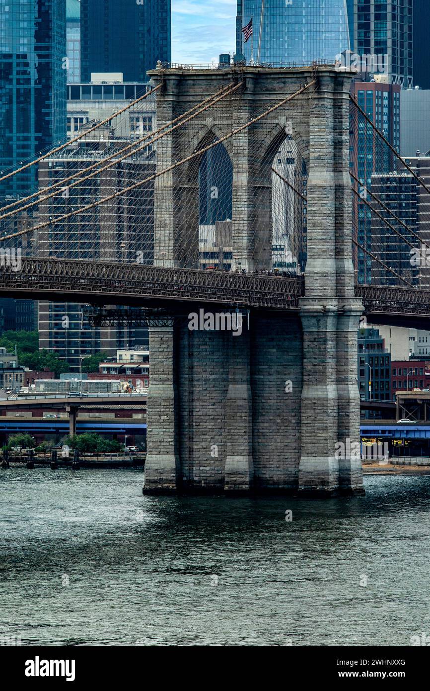 Vertical photo of the famous Brooklyn Bridge linking the boroughs of ...