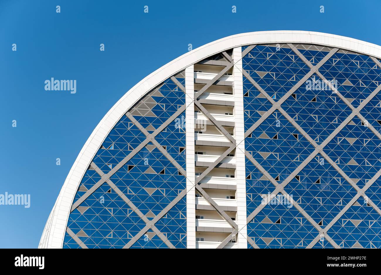 Wall of a modern building with a gradation of blue Stock Photo - Alamy