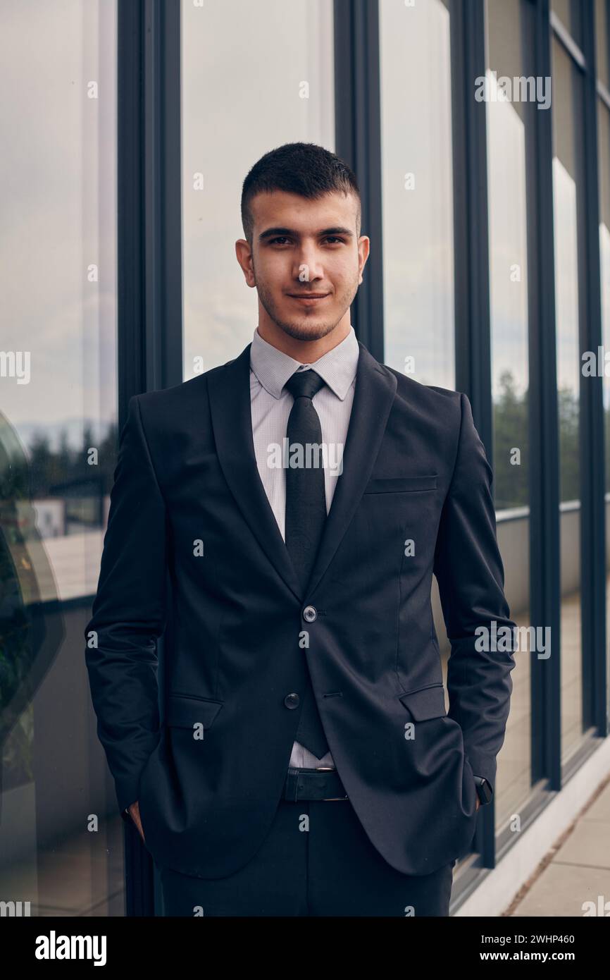 Businessman in sleek suit stands hi-res stock photography and images ...