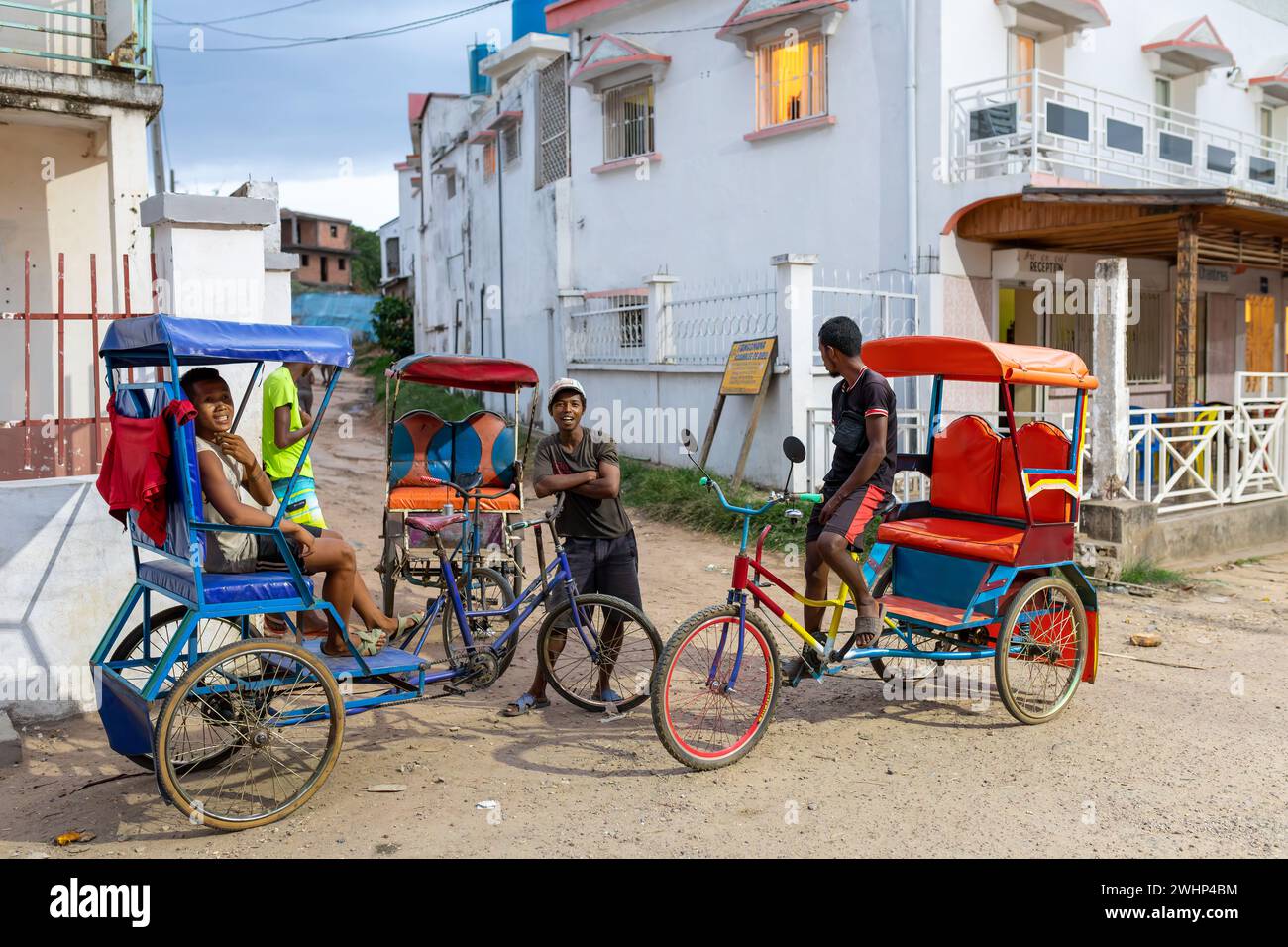 Traditional rickshaw on the city streets. Rickshaws are a common mode ...