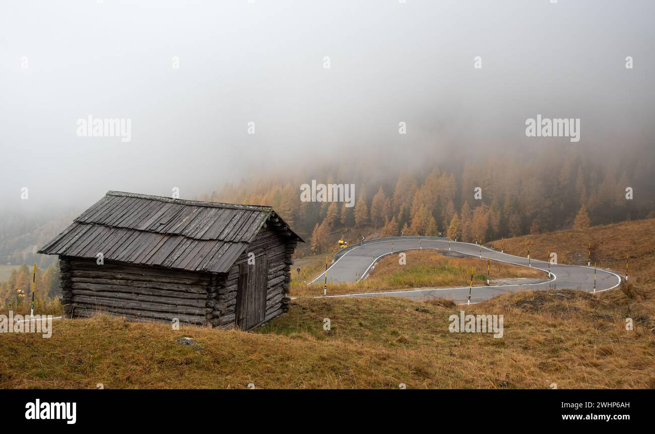 Autumn landscape in the forest. wooden log cabin at the valley. Yellow ...