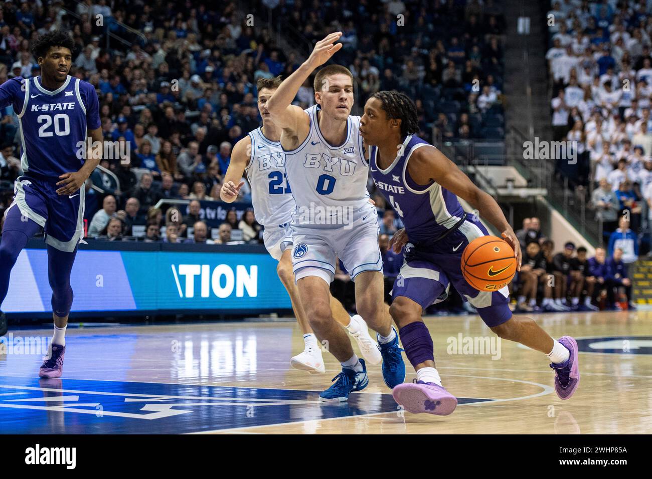 Kansas State guard Dai Dai Ames, right, drives the ball while guarded ...